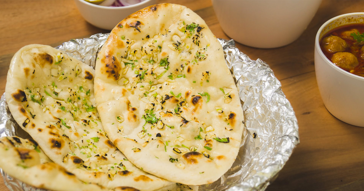 Whole Wheat Garlic Naan Recipe | HungryForever