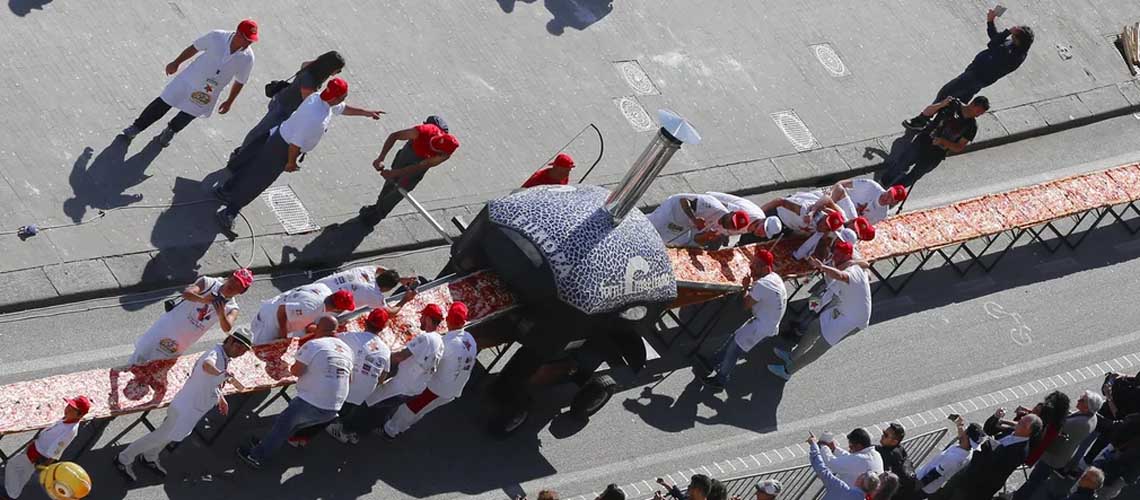100 Chefs and 11 Hours Later, World's Longest Pizza Record Broken ...
